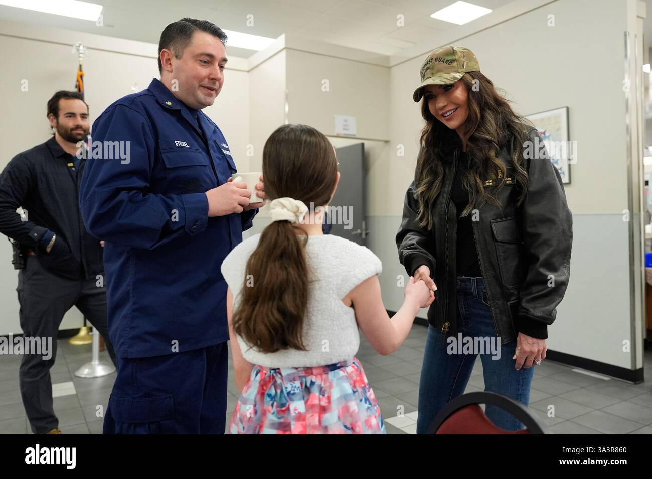 Homeland Security Secretary Kristi Noem, from right, greets Katie ...