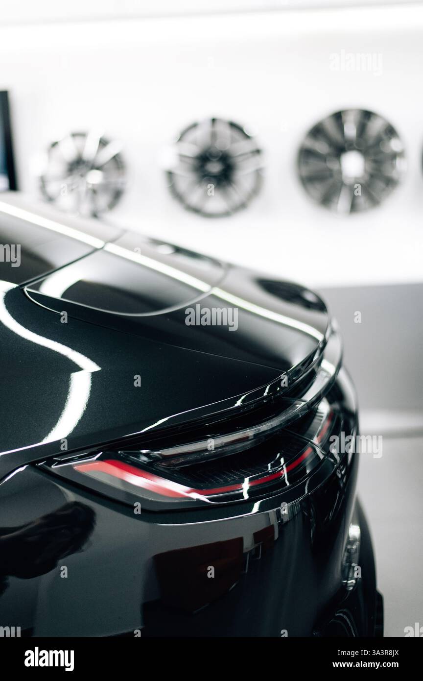 This image features a detailed closeup view of a sleek black car Stock ...
