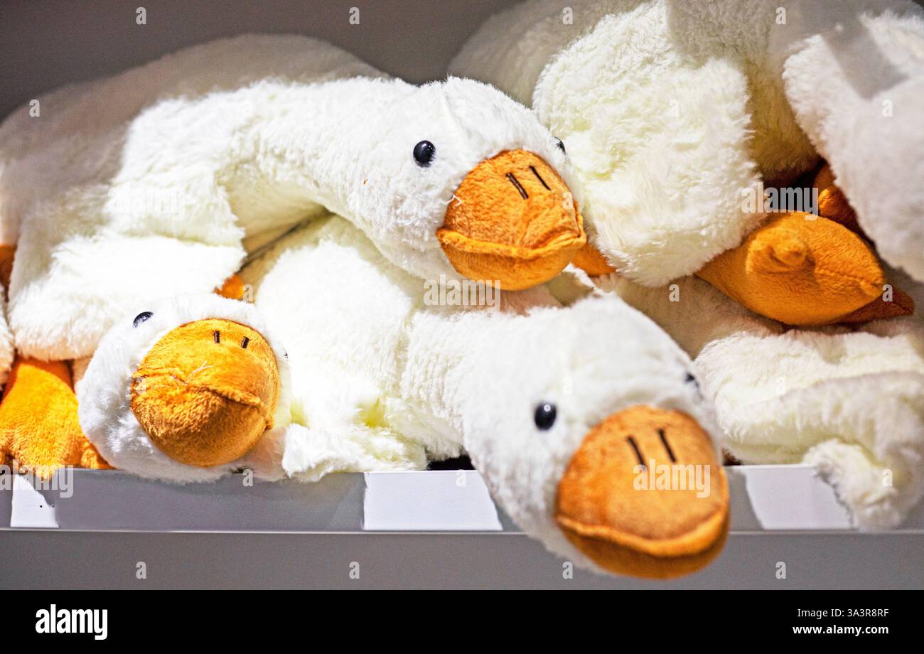 cute plush geese on the counter in the supermarket. Fashion and style ...