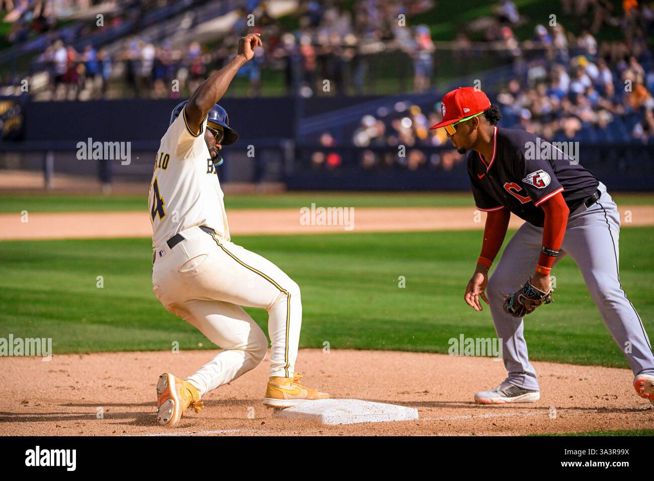 Milwaukee Brewers third base Andruw Monasterio (14) slides into third ...
