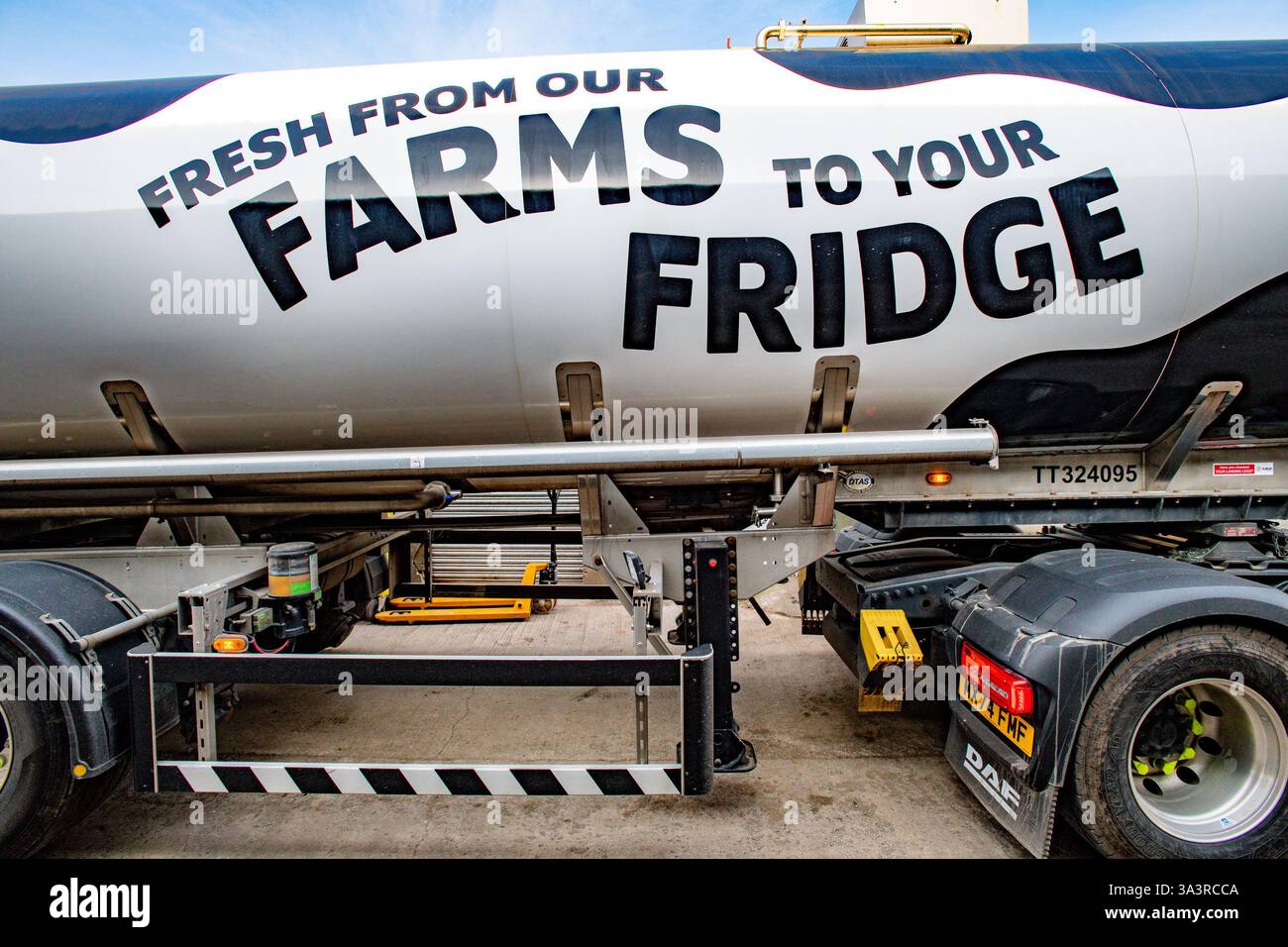 A milk tanker collecting milk from a farm in Cheshire, UK Stock Photo ...