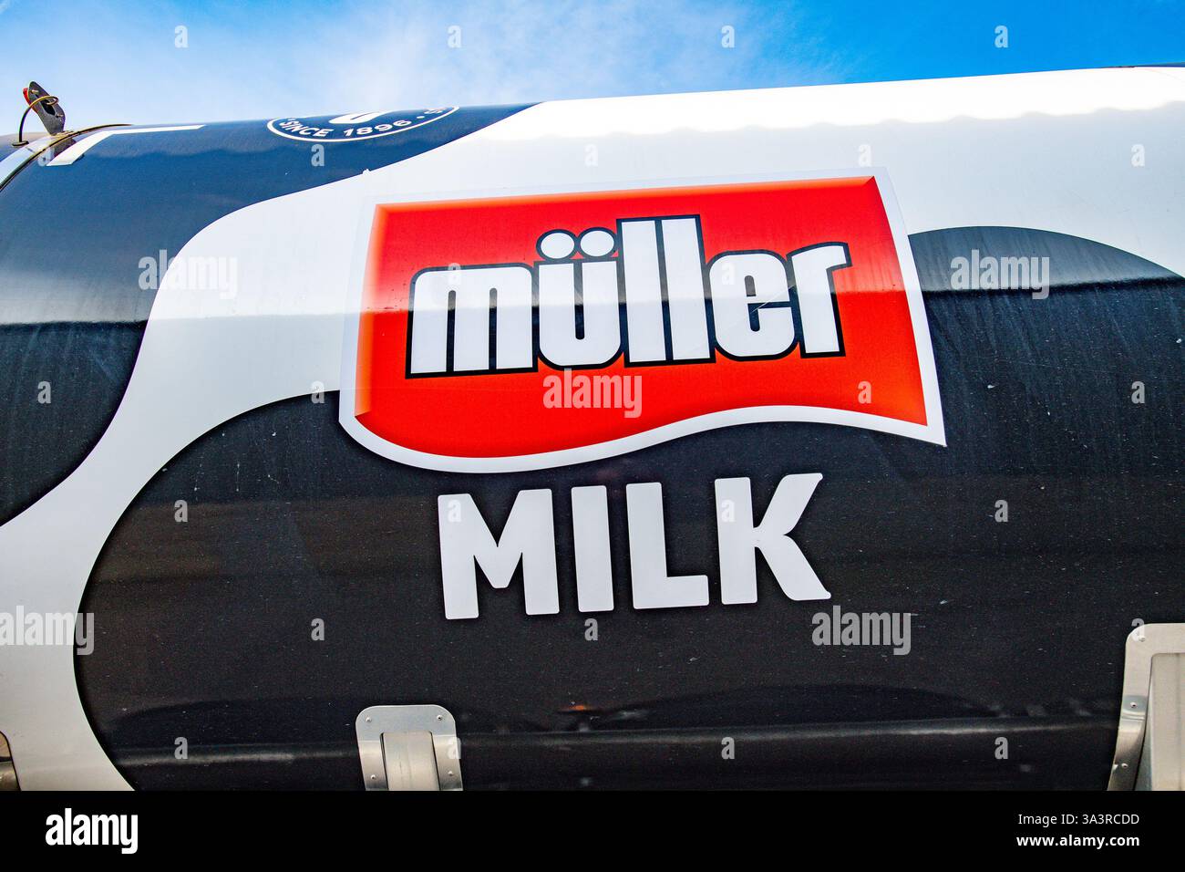 A milk tanker collecting milk from a farm in Cheshire, UK Stock Photo ...