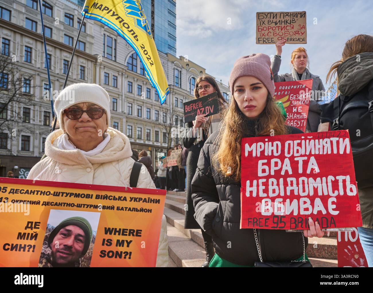 Kyiv, Ukraine - 16th March, 2025 People rally, holding signs saying ...