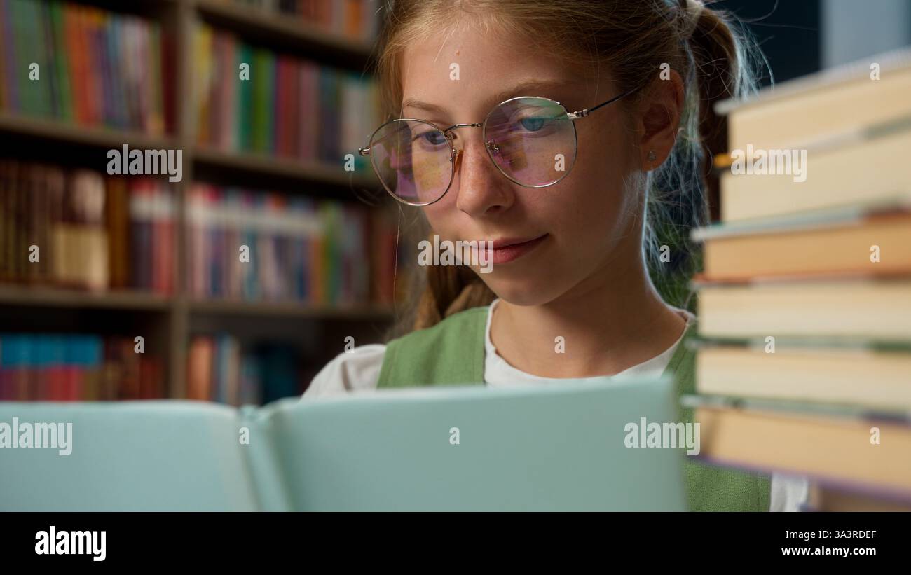 Smart clever Caucasian smiling happy intelligent little girl schoolkid ...