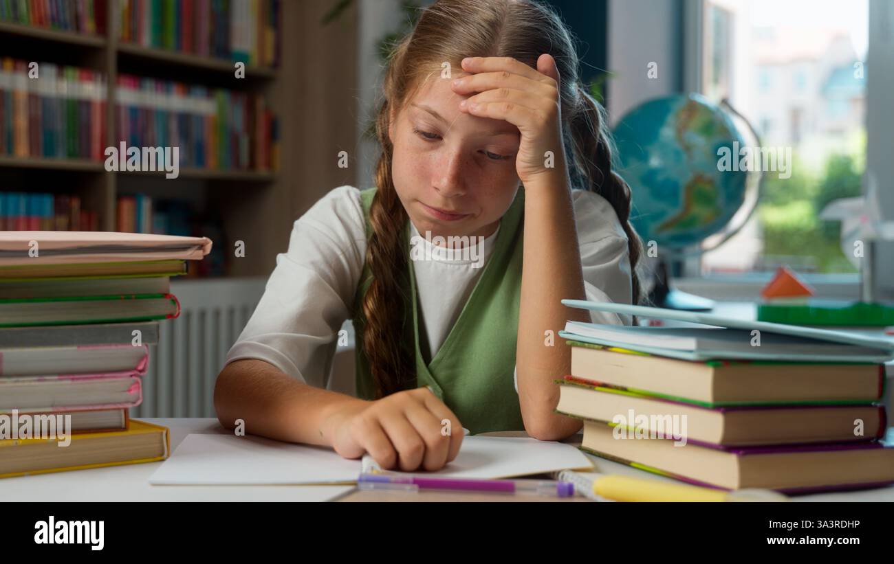Unhealthy tired bored Caucasian little girl child kid schoolgirl school ...
