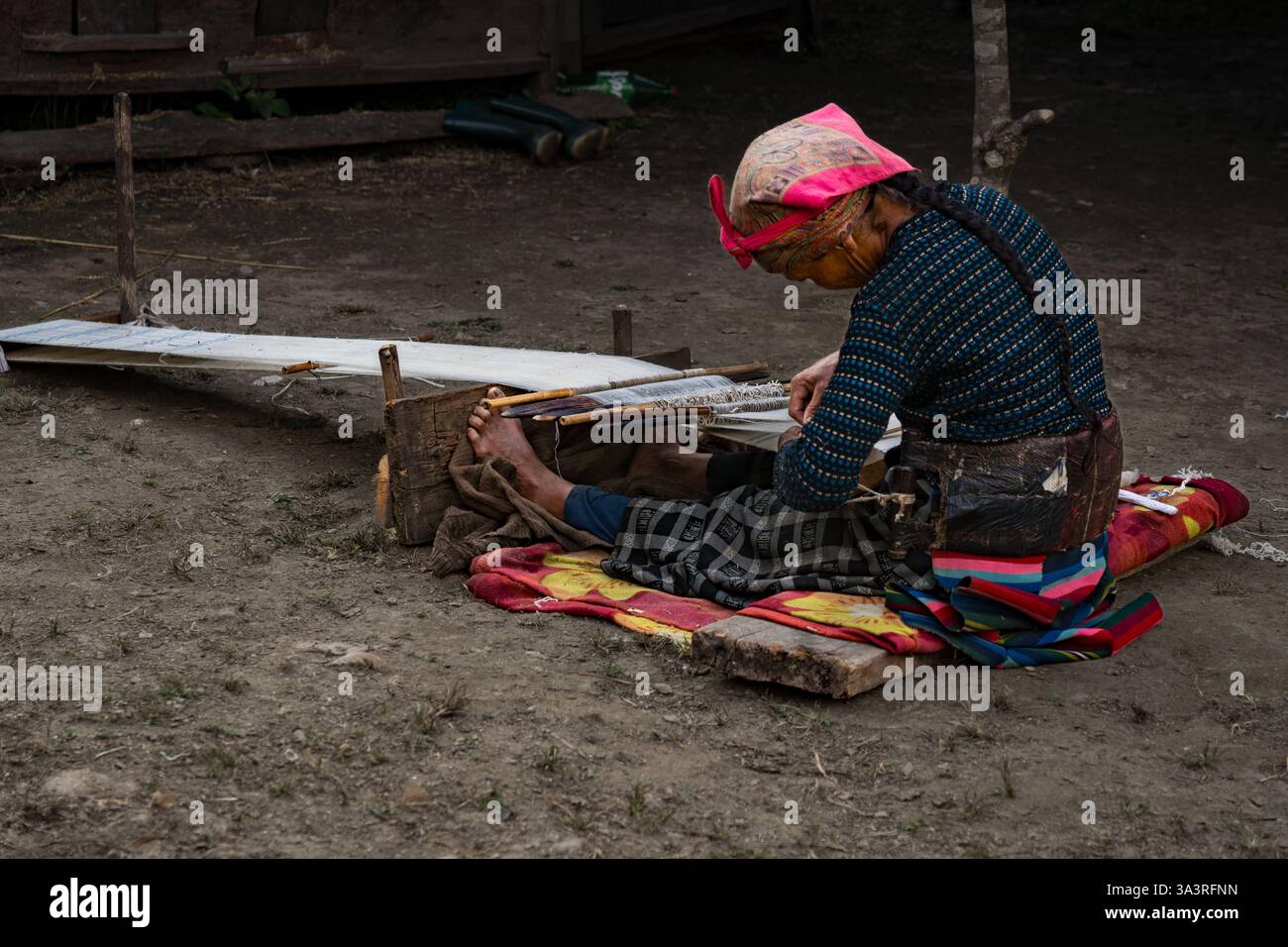 Upper Syafrubesi, langtang, Nepal - October 19, 2024 : A woman weaving ...