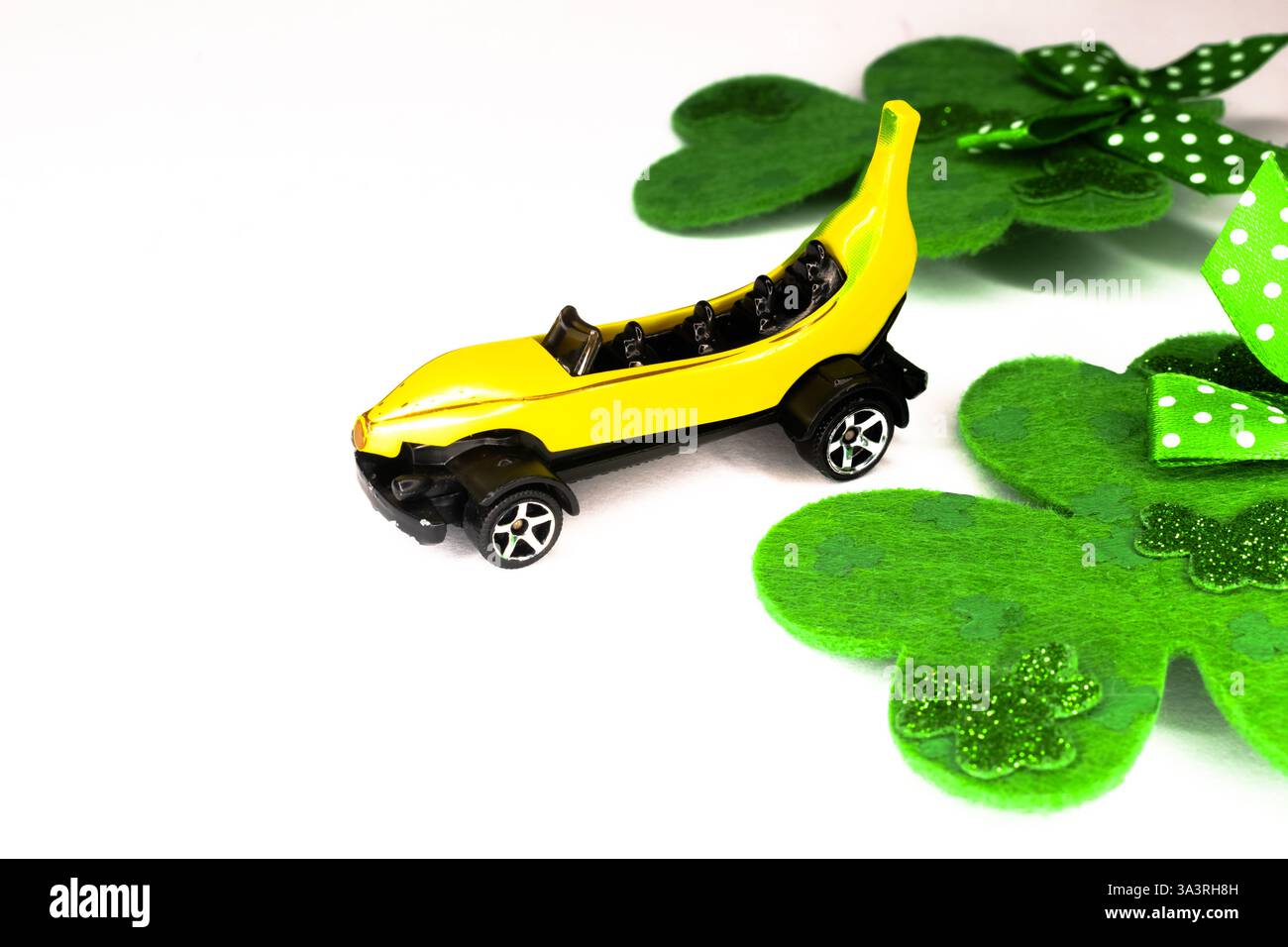 Matchbox Ford banana car with shamrocks isolated on white background ...