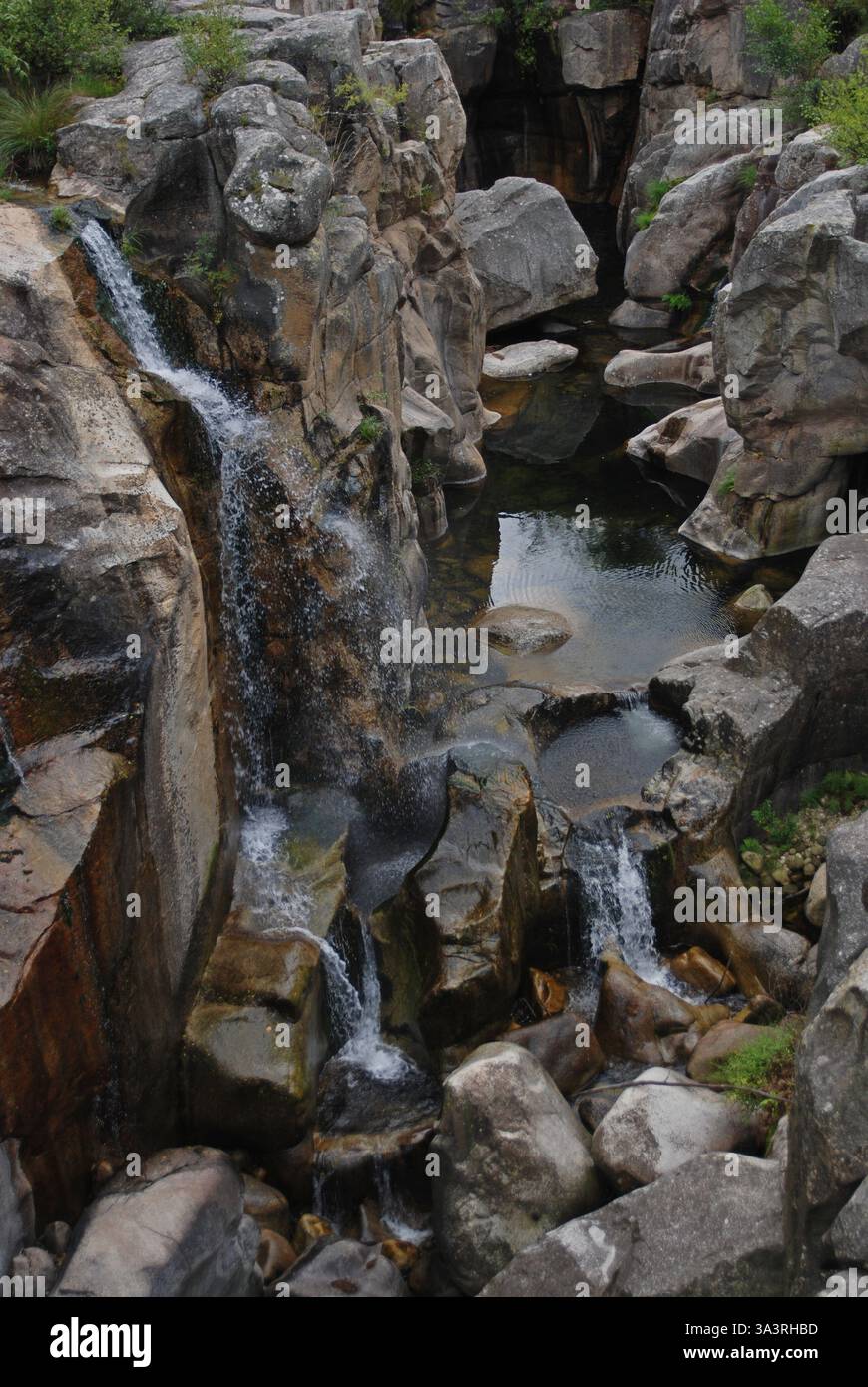 Granite rocks polished and shaped by continuous water action Stock ...