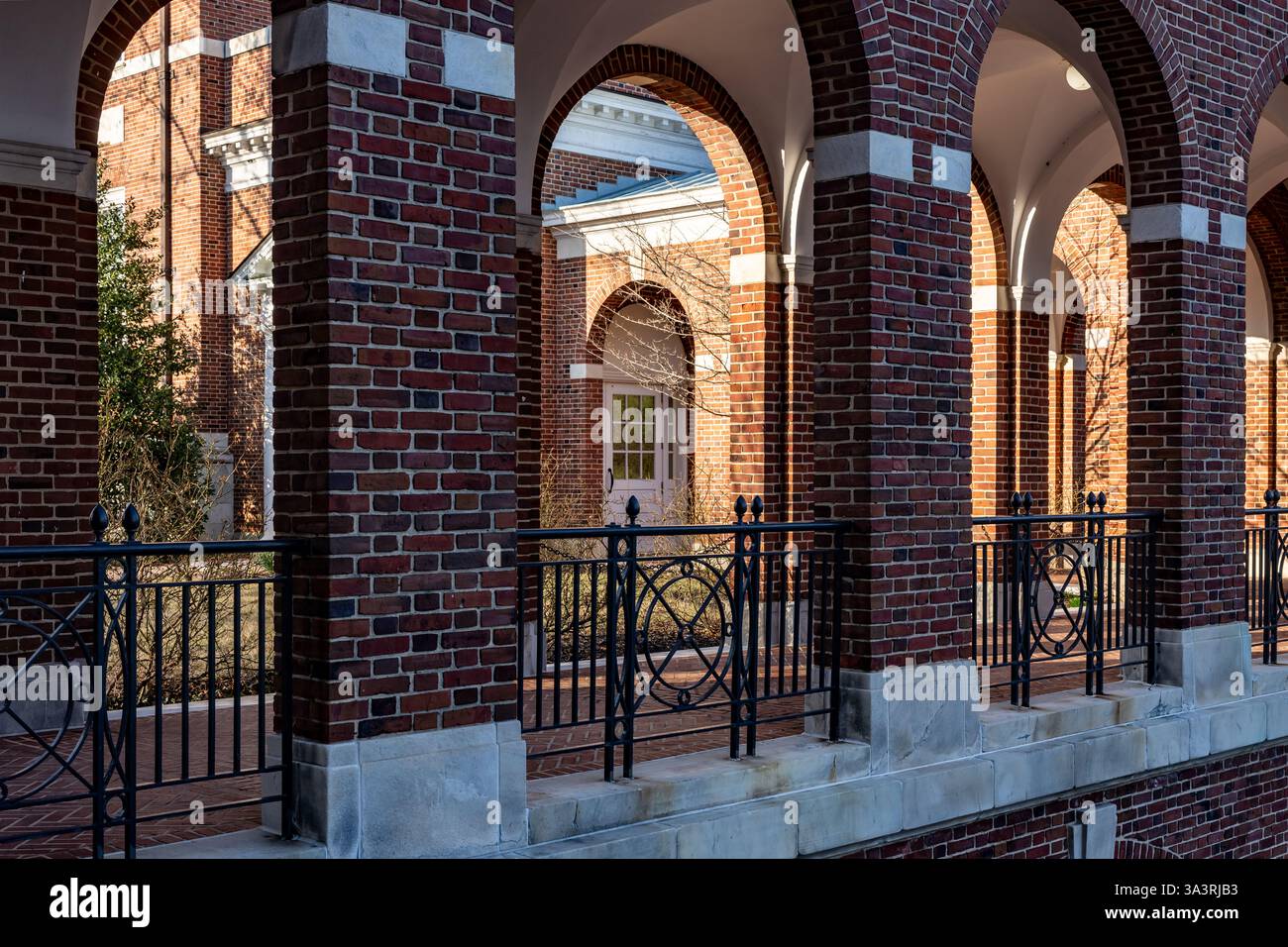 Old arched brick walkway with brick pillars Stock Photo - Alamy