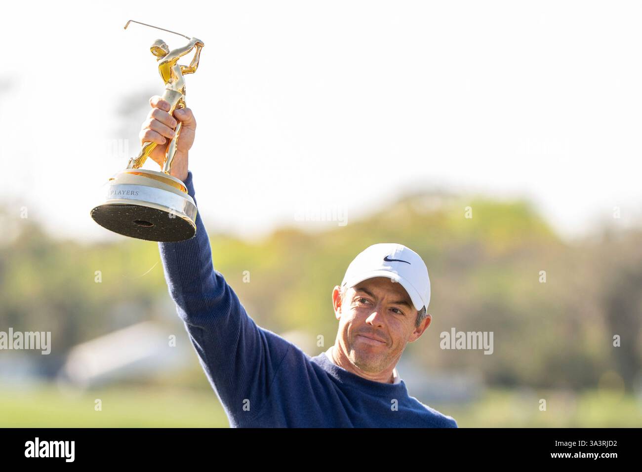 Rory McIlroy, of Northern Ireland, reacts during a trophy ceremony ...
