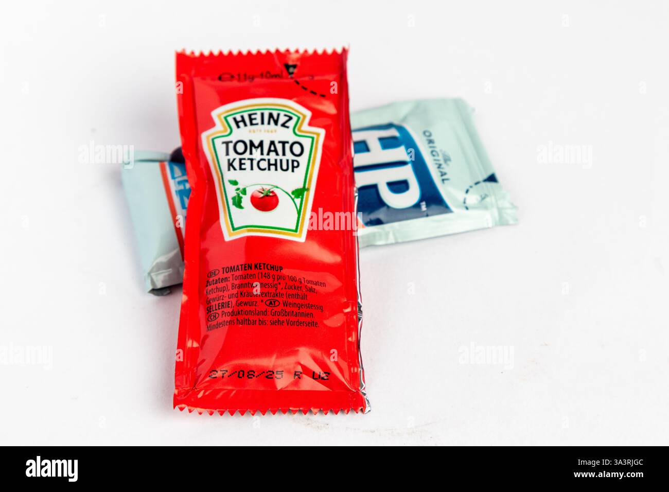 London, United Kingdom 10th March 2025 :- Sachets of HP Brown Sauce and Heinz Tomato Ketchup ...
