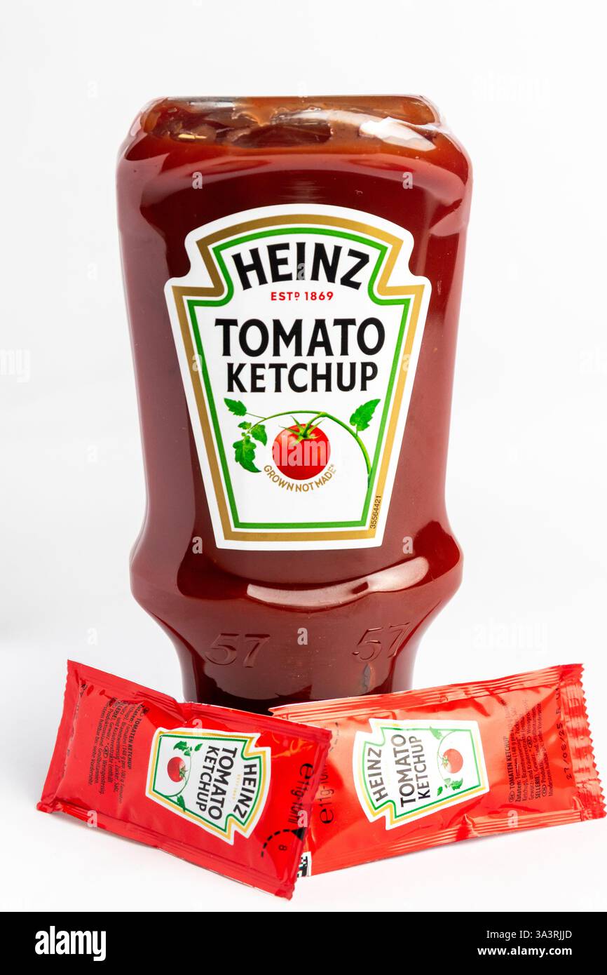 London, United Kingdom 10th March 2025 :- Sachets and Bottle of Heinz Tomato Ketchup. Studio ...