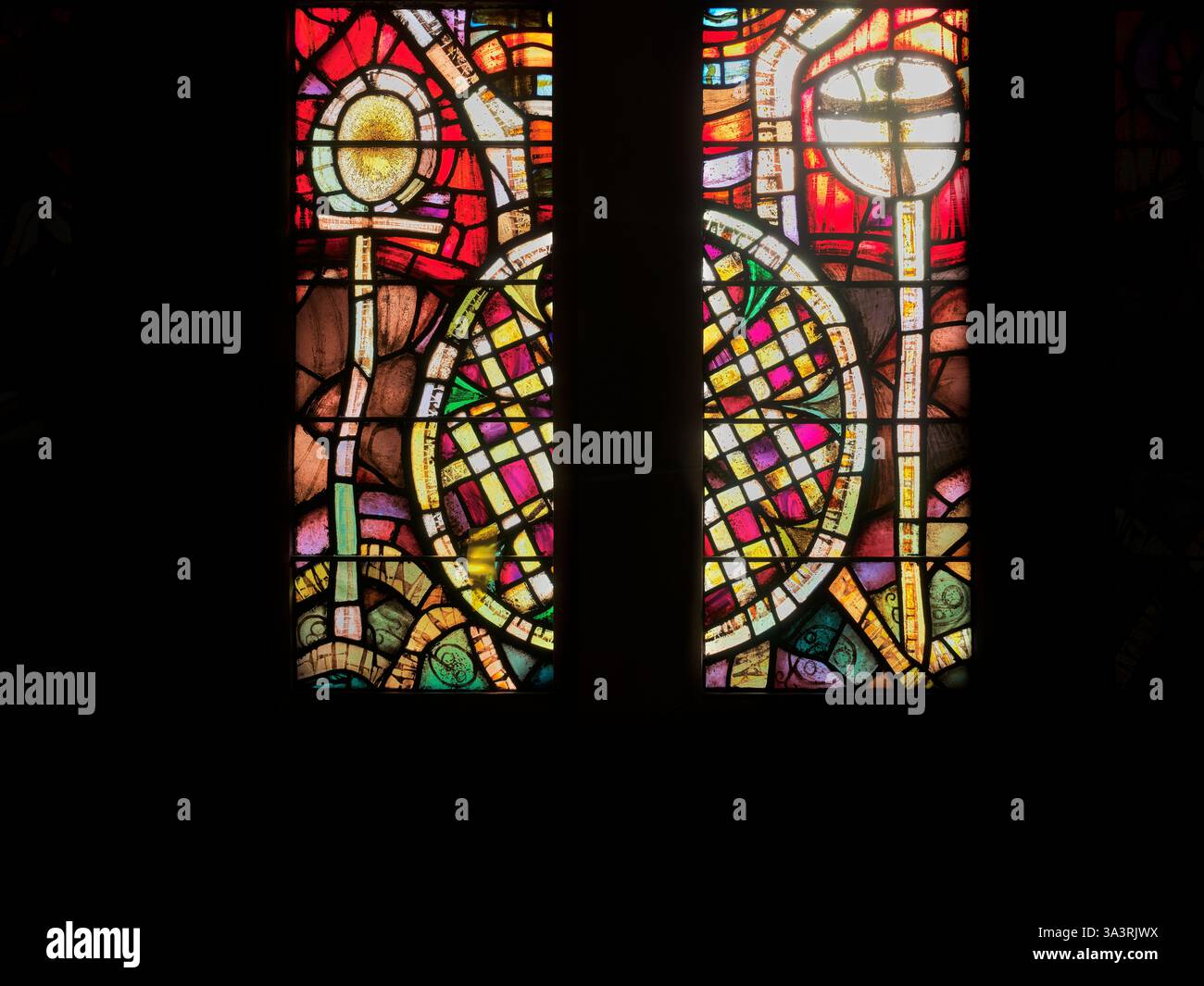 Stained glass window in the christian cathedral in Coventry, England ...