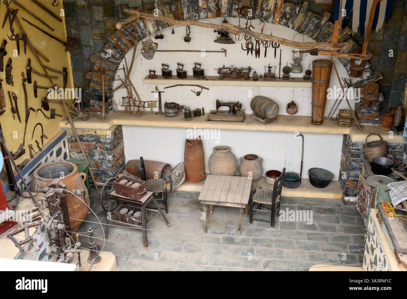 Greek antique farm tools. The Old Town (Chora) of Ano Koufonisi. Small ...