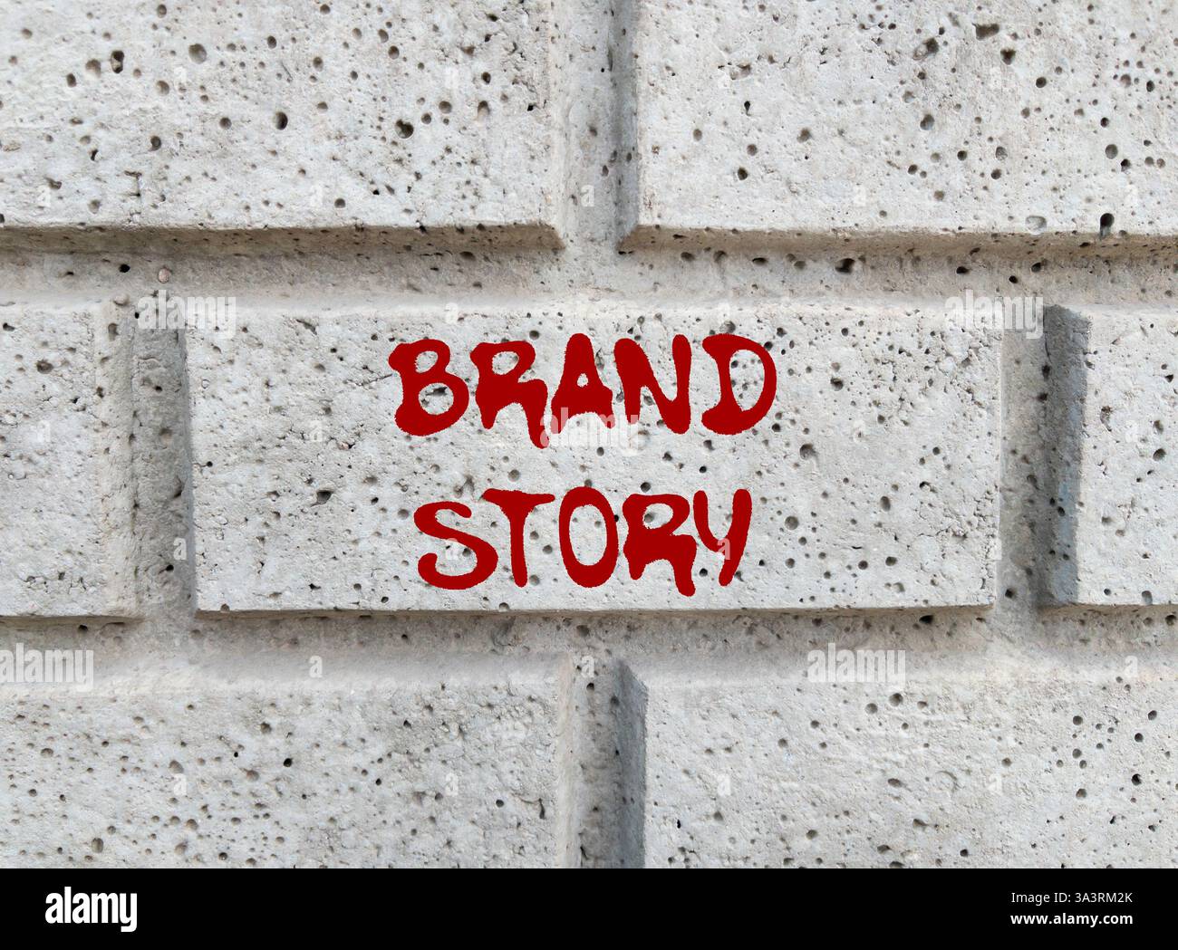 Brand story message written on gray stone wall. Conceptual brand story ...