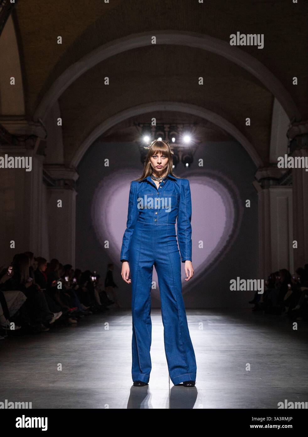 Kyiv, Ukraine - Feb 14, 2025: A model confidently presents a striking ...