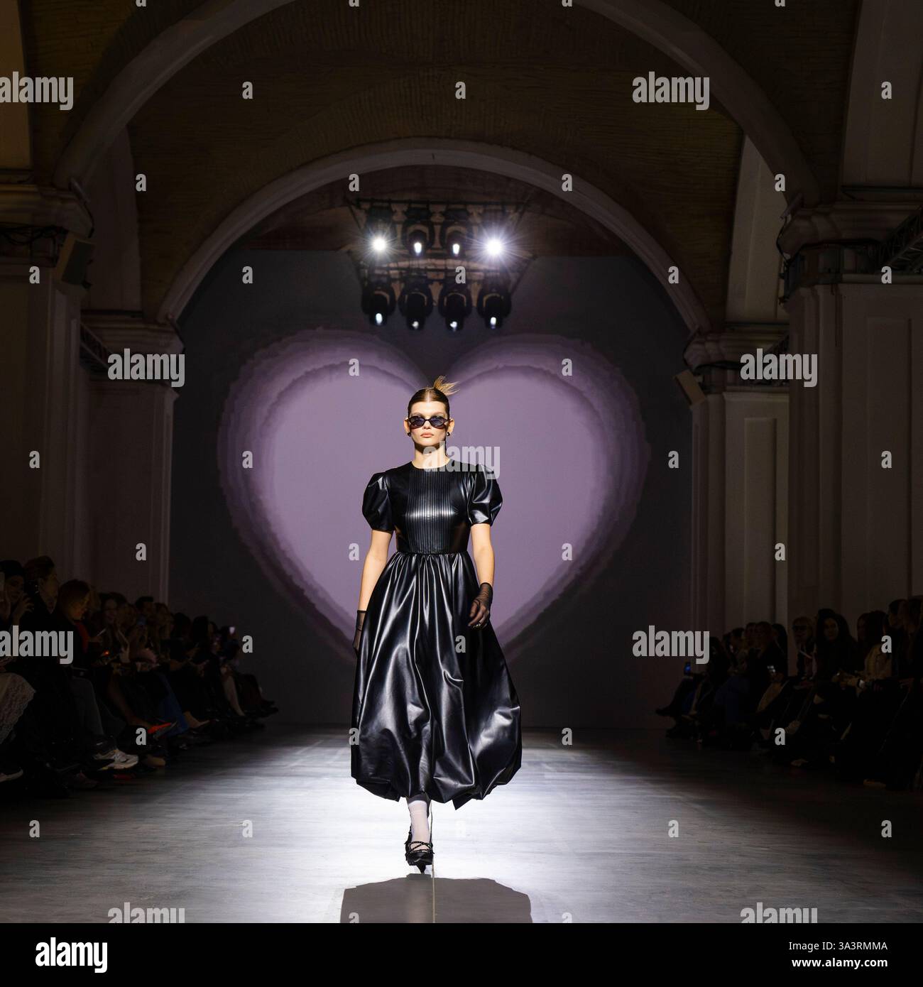 Kyiv, Ukraine - 14th February, 2025: A model strides confidently down ...