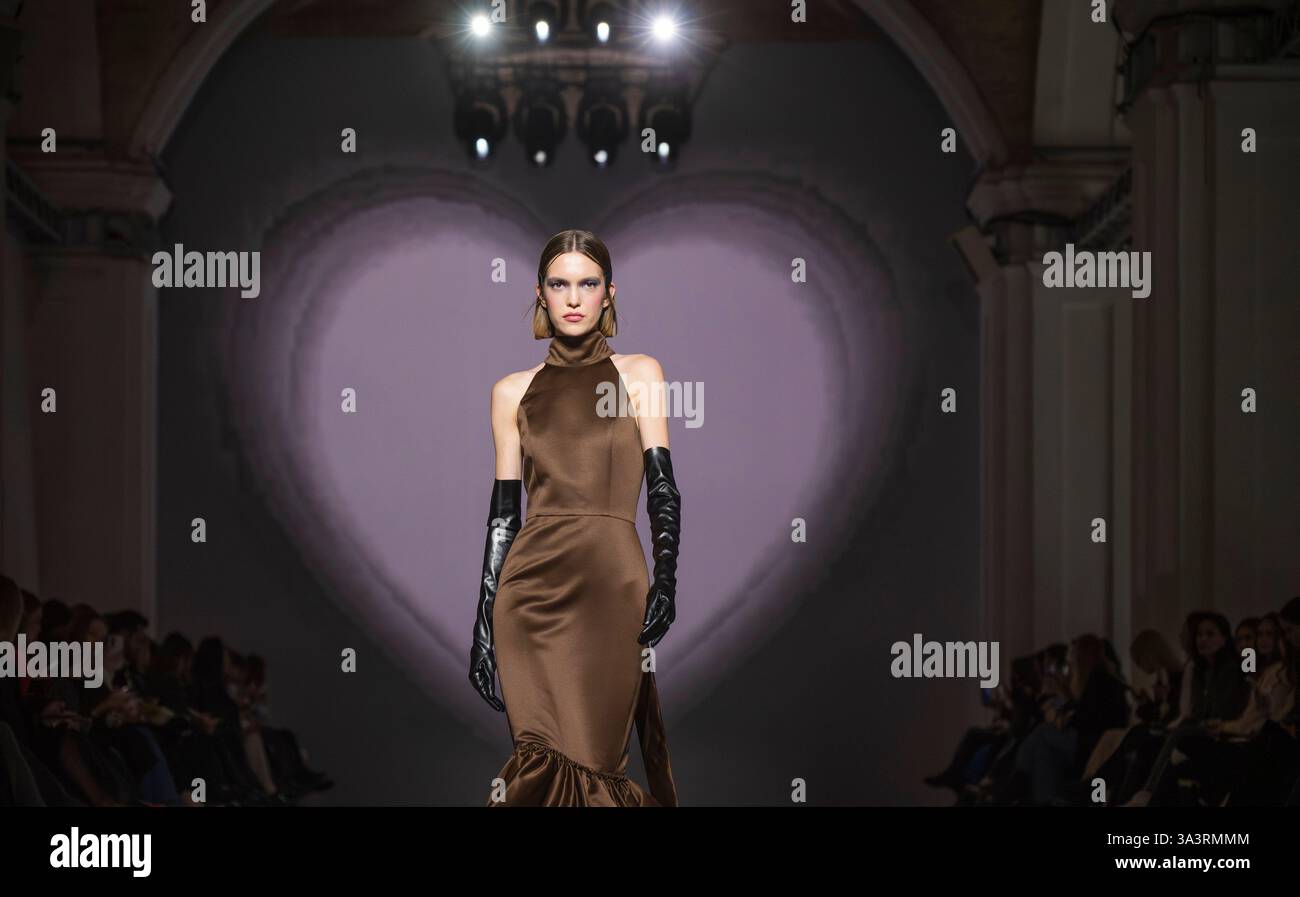 Kyiv, Ukraine - 14th February, 2025. A model showcases a stunning brown ...