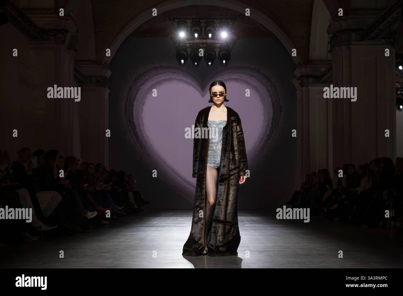 Kyiv, Ukraine - 14th February, 2025: A model confidently showcases a ...