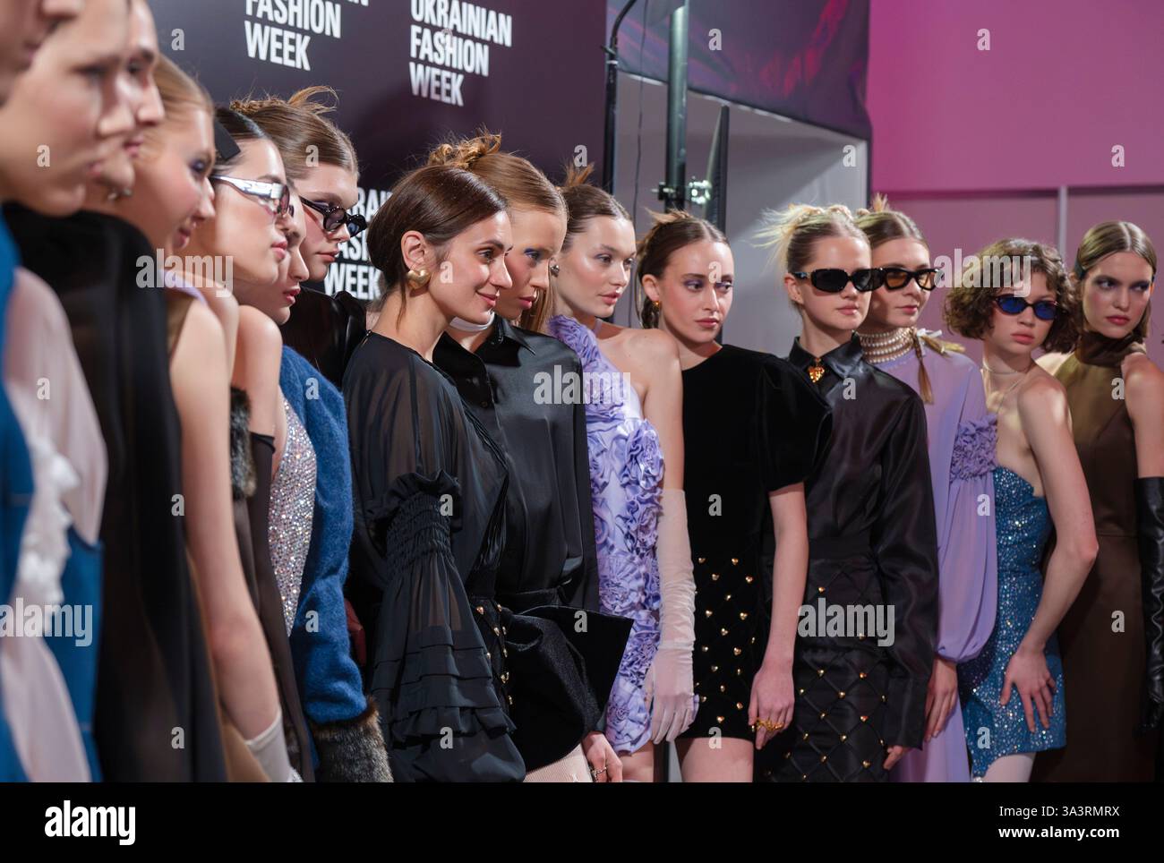 KYIV, UKRAINE - FEBRUARY 14: Designer Olena Guranda (C) poses with ...
