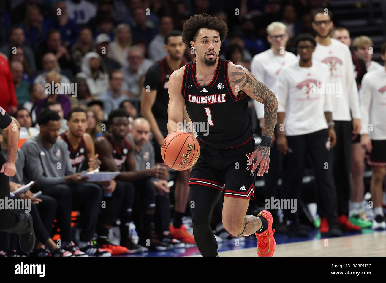CHARLOTTE, NC - MARCH 15: Louisville Cardinals guard J'Vonne Hadley (1 ...