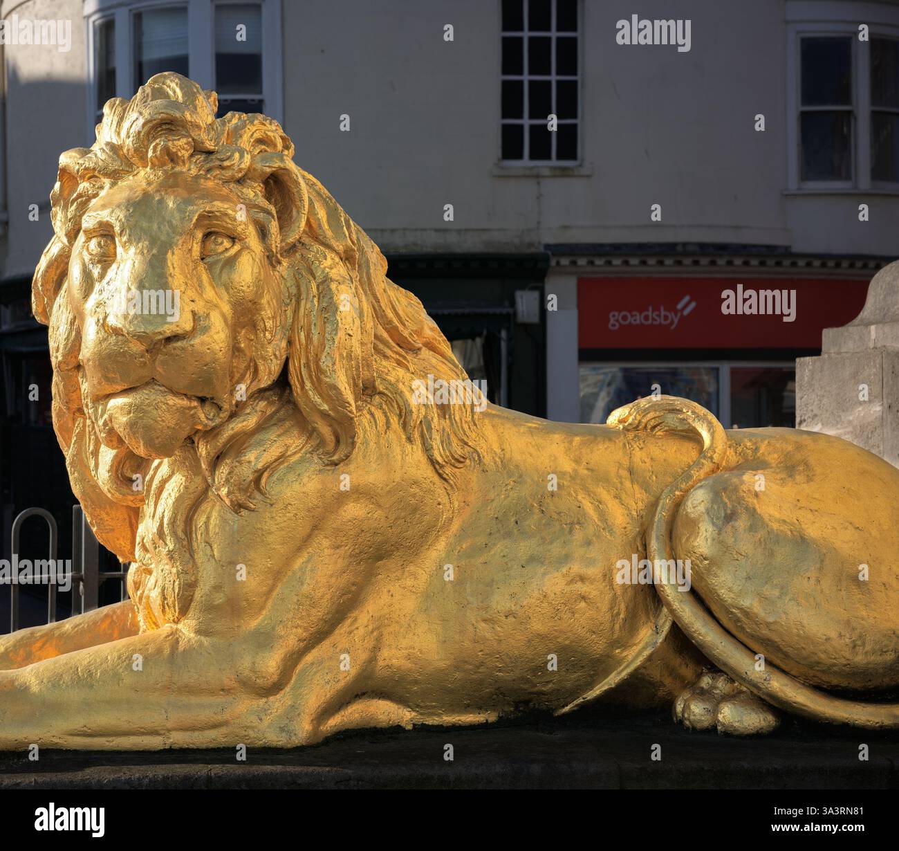 Lion statue on the memorial to King George III, on the promenade at ...