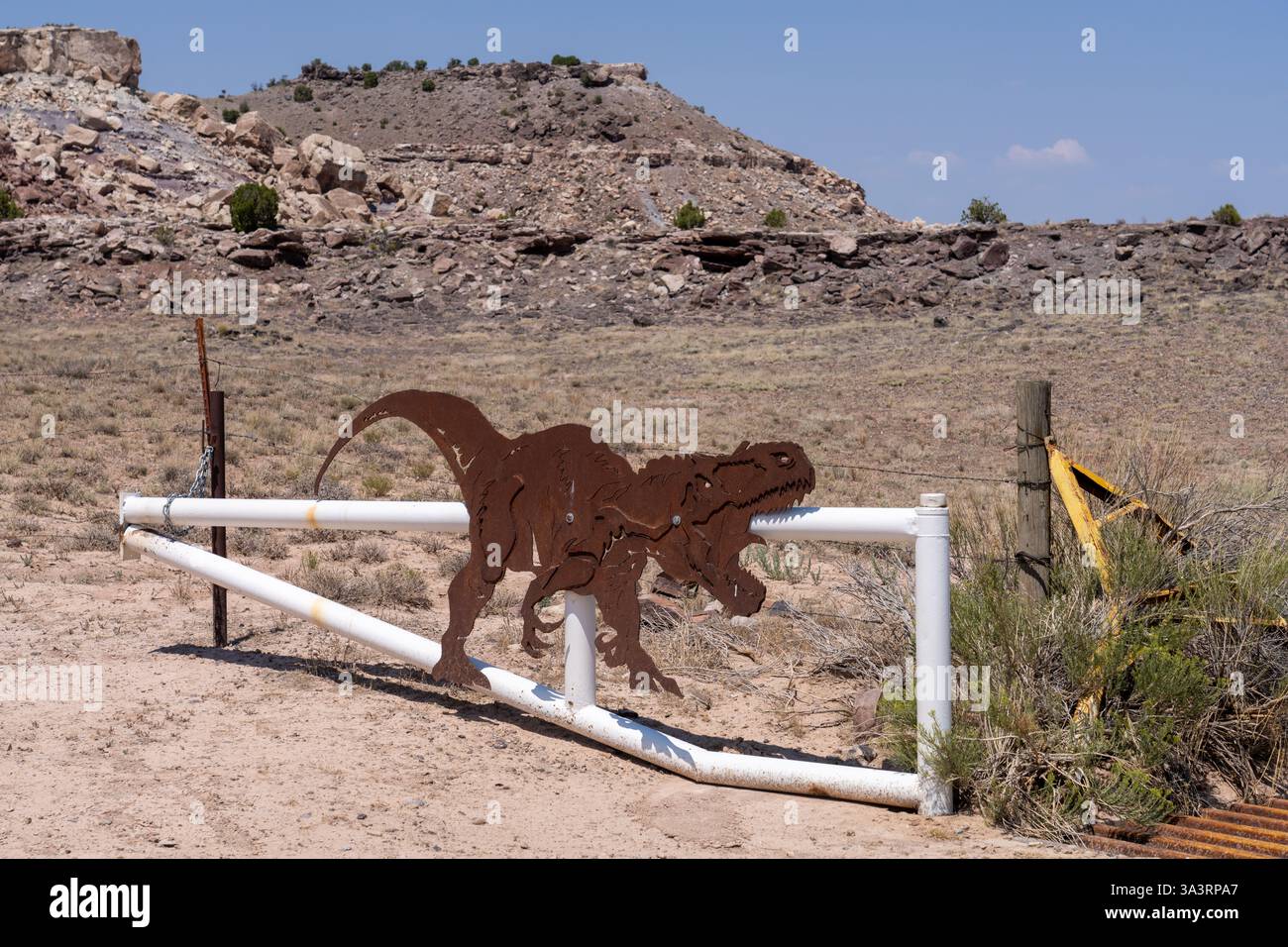 A metal allosaurus dinosaur sculpture at the gate of the Cleveland ...