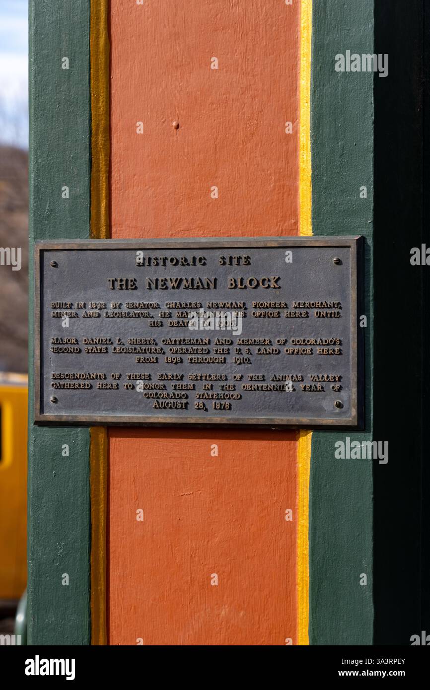 A bronze plaque on the historic Newman Block, or Newman Building, built ...