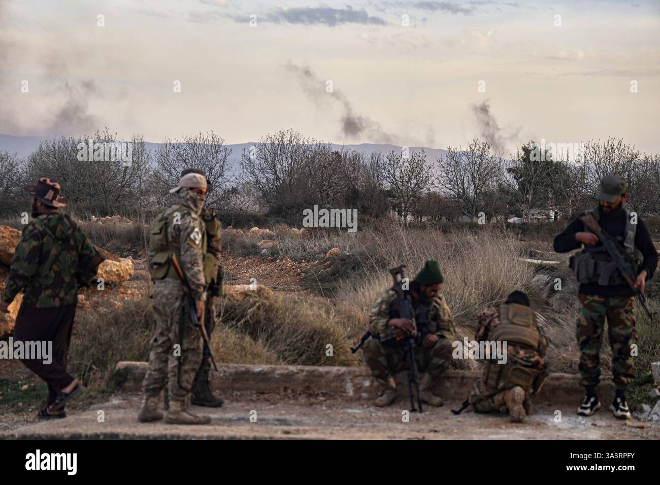 Syrian troops take position in the village of Hawsh al-Sayyid Ali ...