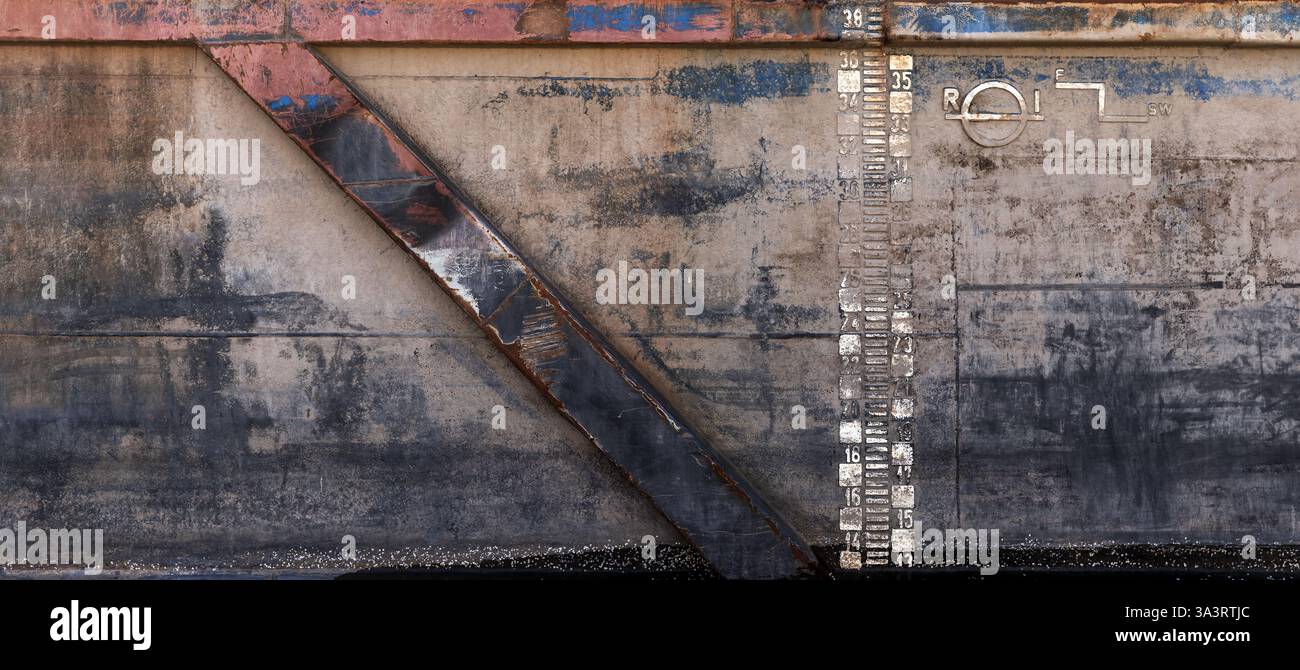 Detailed texture of a weathered industrial metal hull surface ...