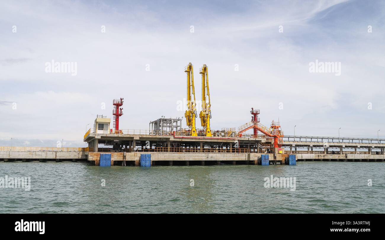 An industrial oil jetty platform with machinery and equipment located ...