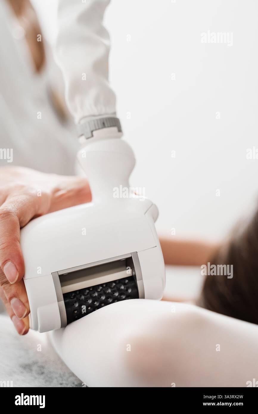 Lymphatic drainage procedure. Doctor is using lymphatic drainage to ...