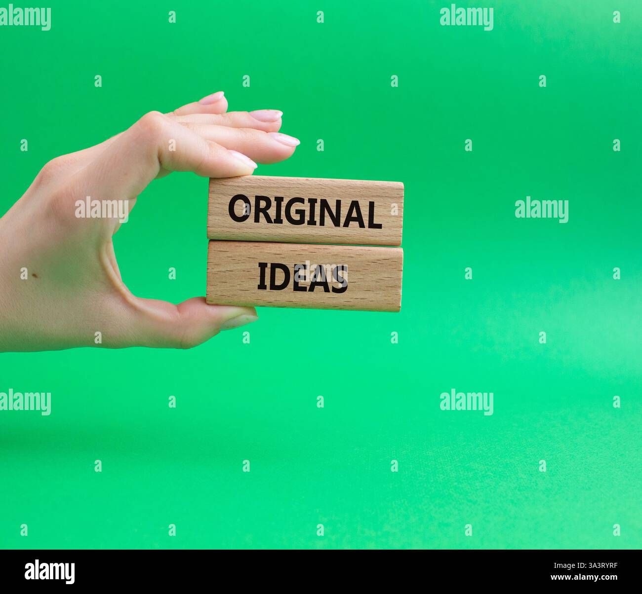 Original ideas symbol. Concept word Original ideas on wooden blocks. Businessman hand. Beautiful ...