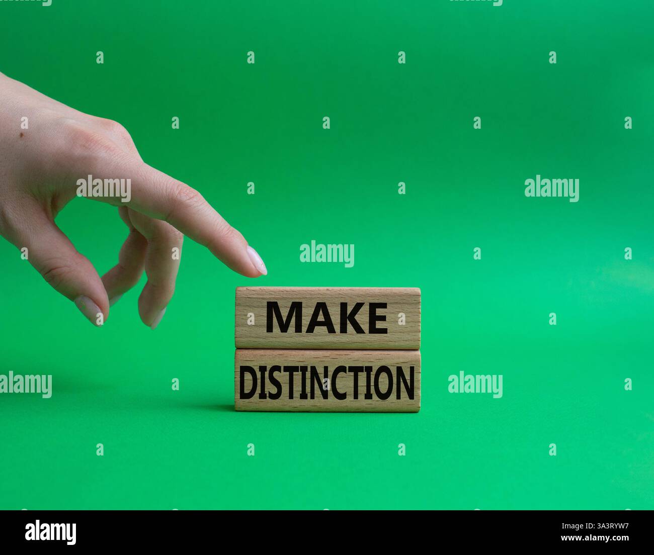 Make distinction symbol. Concept words make distinction on wooden ...