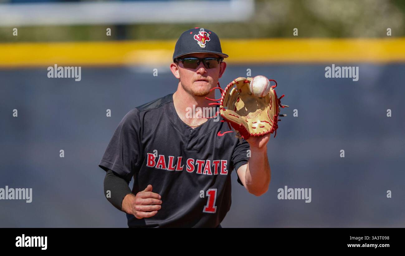 Ball State utility Grant Miller (1) warms up before an NCAA baseball ...
