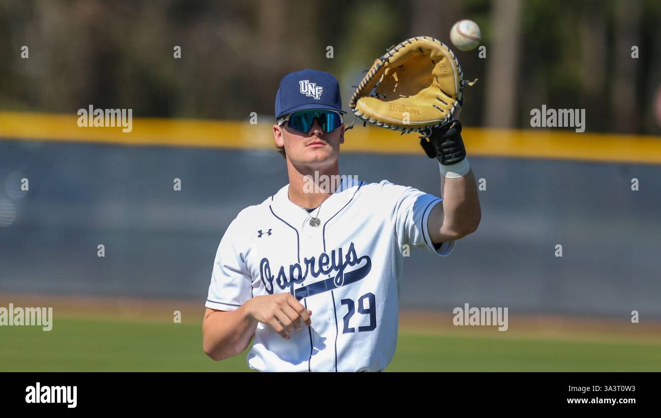 North Florida utility Connor Witherington (29) warms up before an NCAA ...