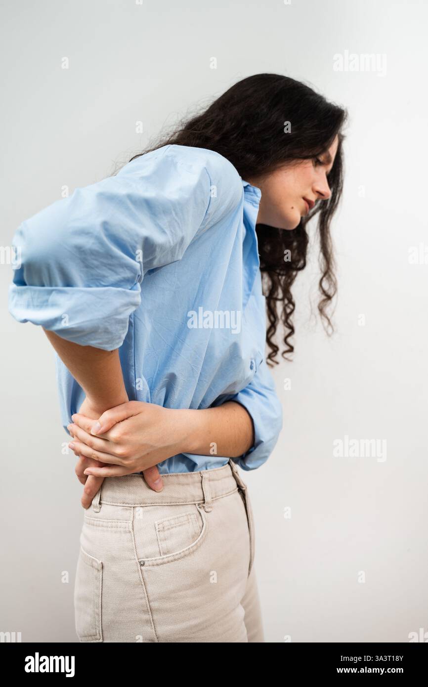 Attractive woman feel backache spine pain because of UTI pyelonephritis ...