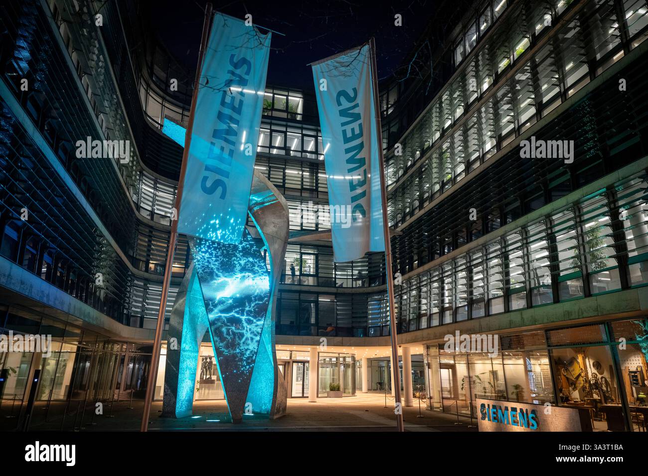 Munich, Germany. 17th Mar, 2025. The word "Siemens" can be seen on flags in front of the ...