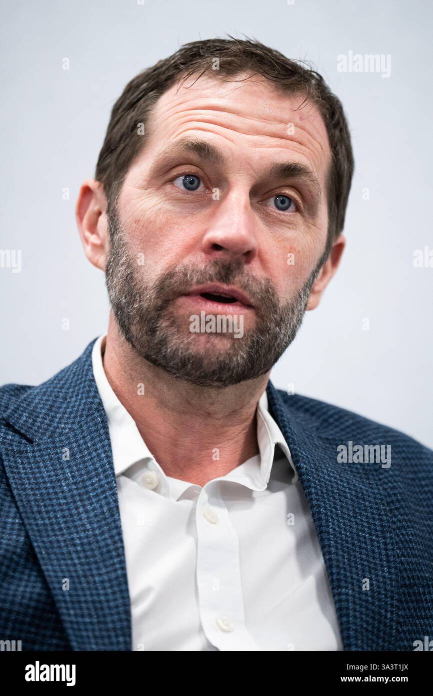 UNITED STATES - MARCH 13: Rep. Jason Crow, D-Colo., is interviewed ...