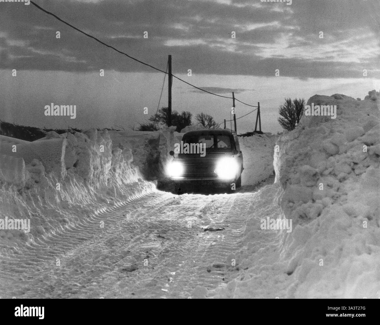 A newspaper delivery van on country lane near Bettisfield in Shropshire ...