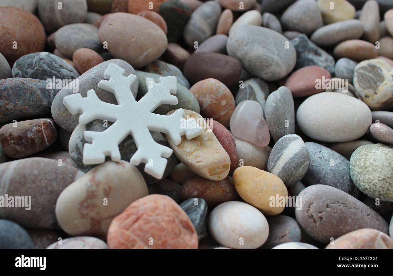 3D Printed Snowflake Lie On a Cold Rocks at Sea Shore. Cold Weather at ...