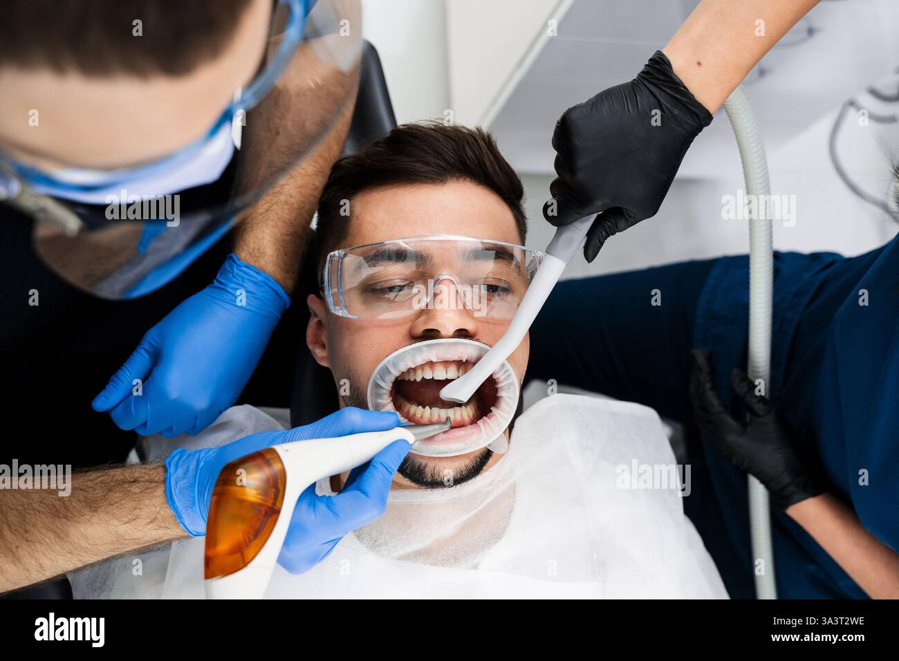 Airflow teeth cleaning process hi-res stock photography and images - Alamy