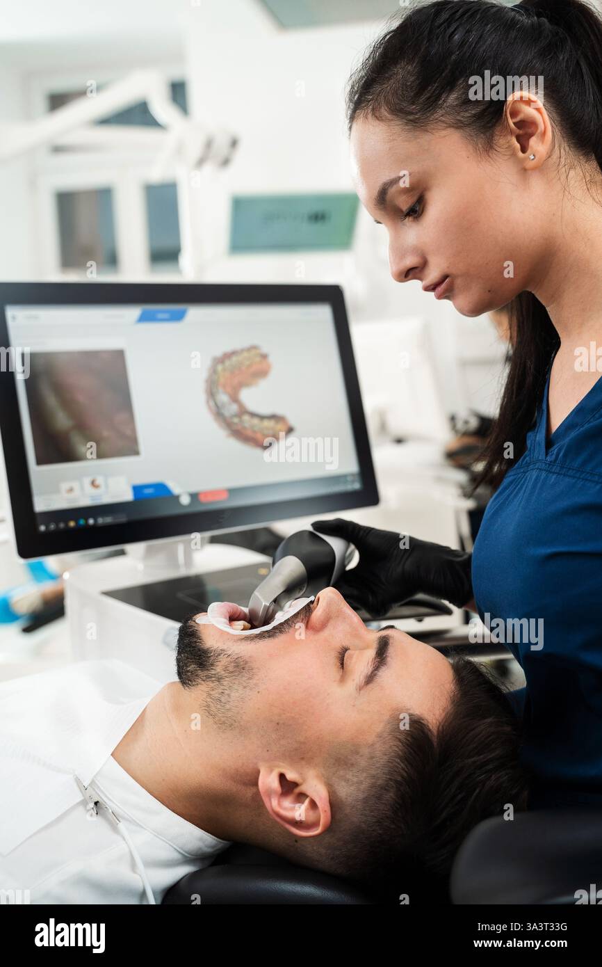 Dental 3d scanner applying process. Digital impressioning teeth of ...