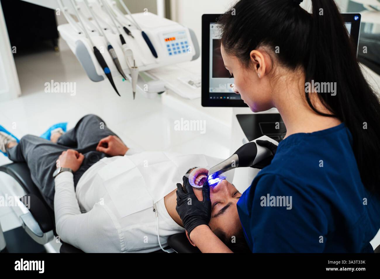 Digital impressioning teeth of patient with 3d digital dental scanner ...