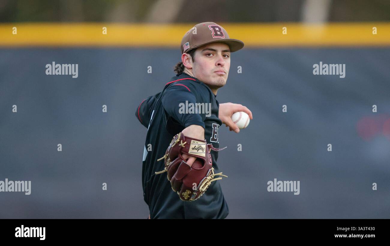 Brown pitcher Ty Harris (35) warms up before an NCAA baseball game ...