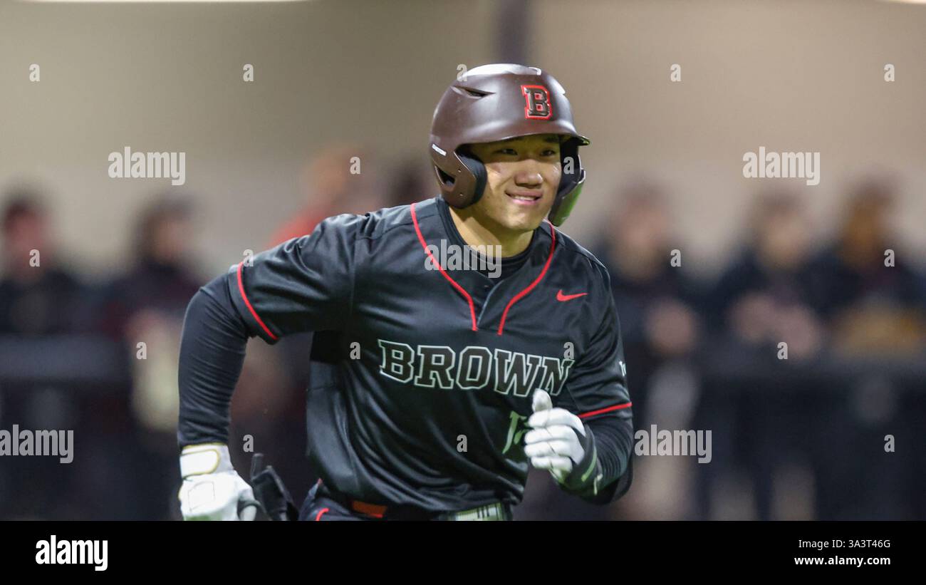 Brown catcher Brandon Chang (13) runs to first during an NCAA baseball ...