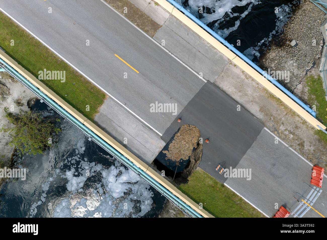 Roadworks site. Reconstruction of damaged road bridge destroyed by ...