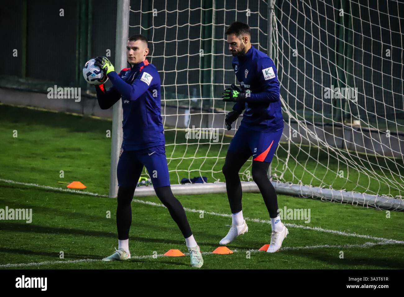 Split, Hrvatska. 17th Mar, 2025. Goalkeepers Dominik Livakovic and ...