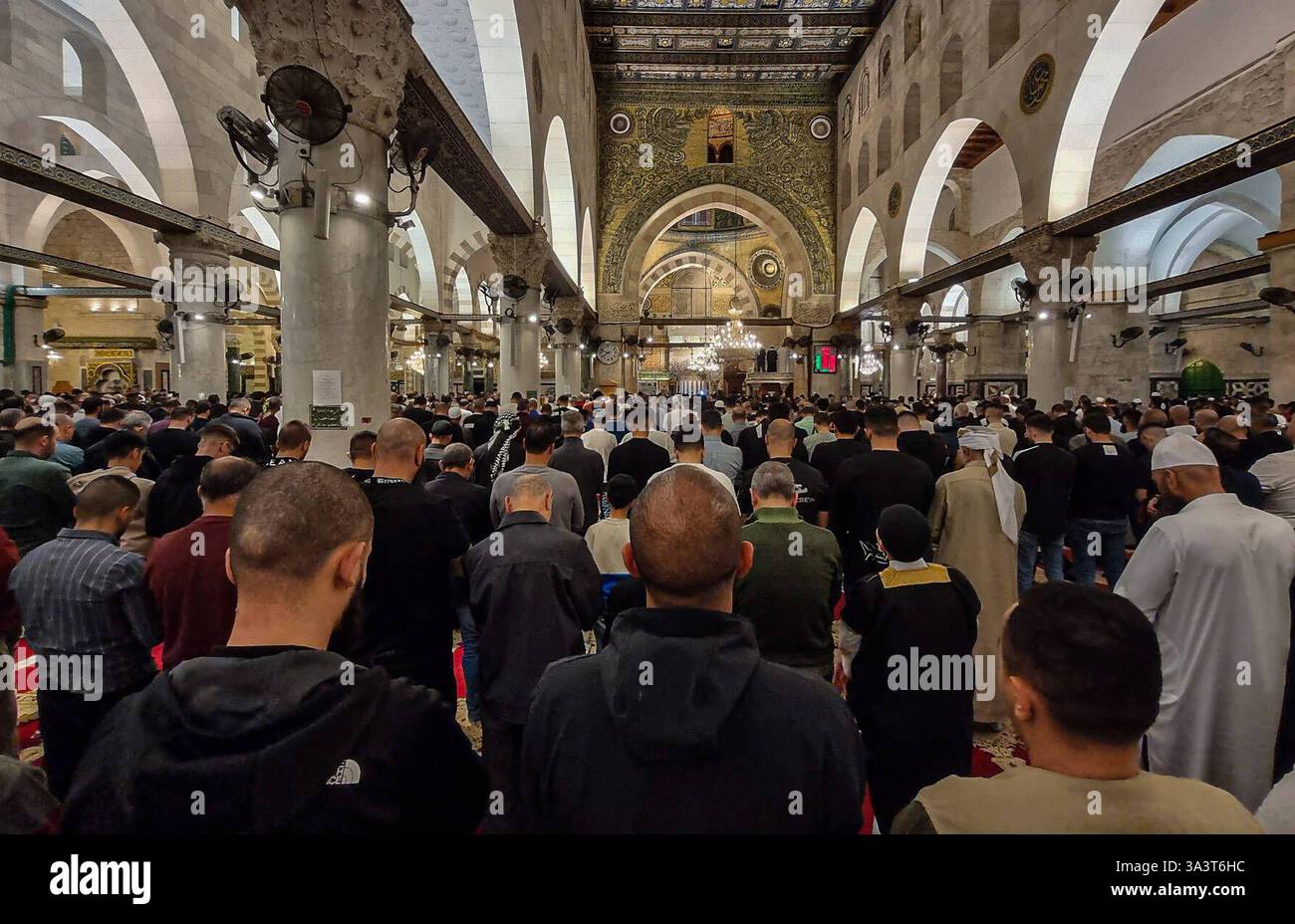 Muslim worshippers hold the Taraweeh evening prayer of Ramadan in the ...
