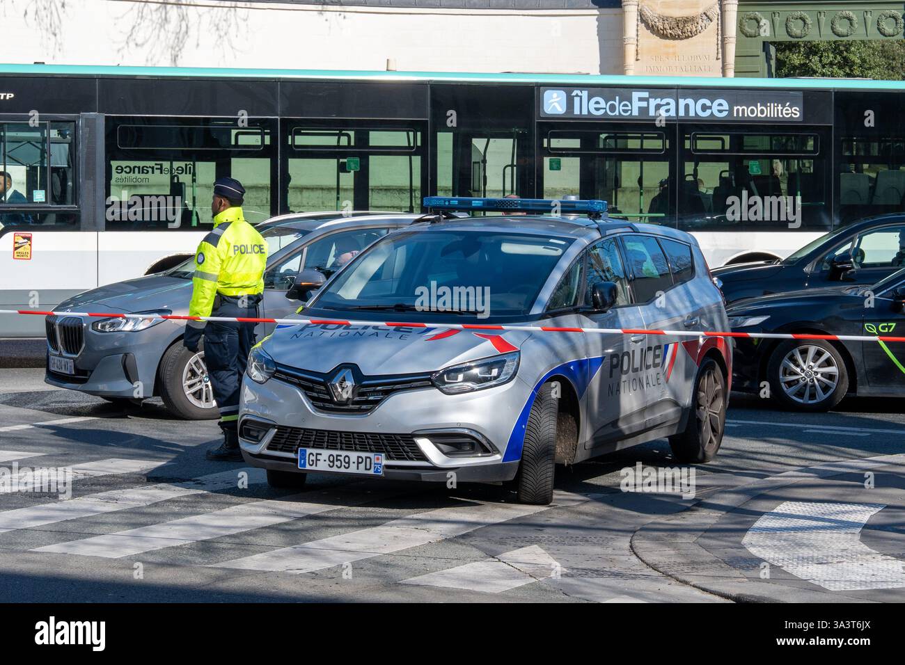 Police intervention at busy intersection in Paris, showcasing authority ...